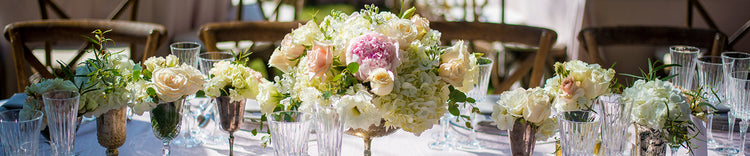 Wedding centerpieces from Moda Flowers.–Moda Flowers